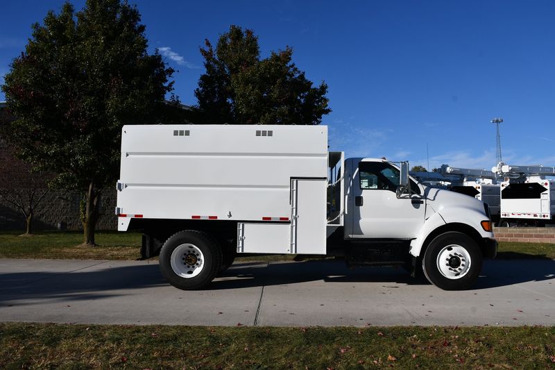 2015 FORD F750 12.5FT CHIP BODY WITH L SHAPED TOOL BOXES