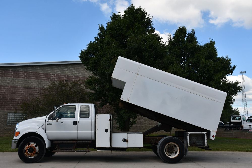 2007 FORD F750 15 FT ARBORTECH CHIP BODY WITH L SHAPE TOOL BOXES