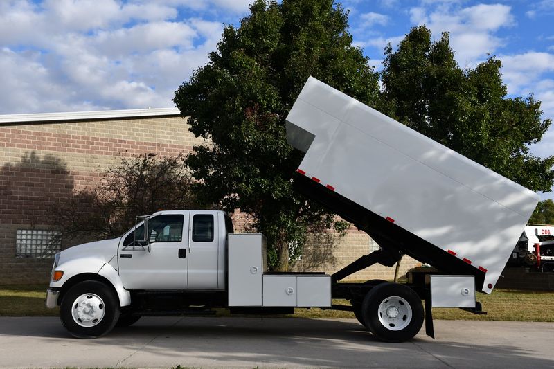 2006 FORD F750 14 FT ARBORTECH CHIP BODY WITH L SHAPE TOOL BOXES